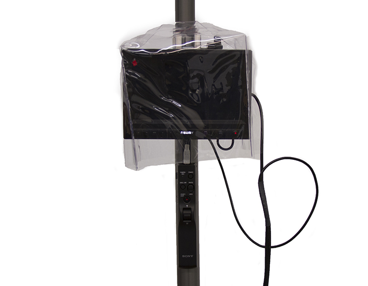 A waterproof plastic cover for the monitor, monitor battery, and Sony ...